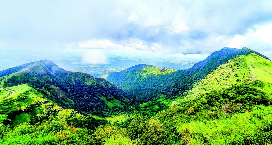 Ancient volcano’s rock formations, tropical beauty draw visitors ...